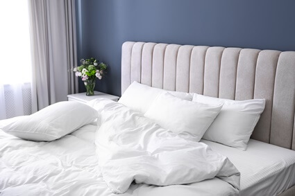 Is It Bad To Put Damp Sheets on Your Bed?