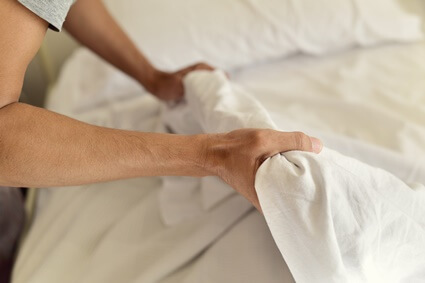 Is It Bad To Put Damp Sheets on Your Bed?